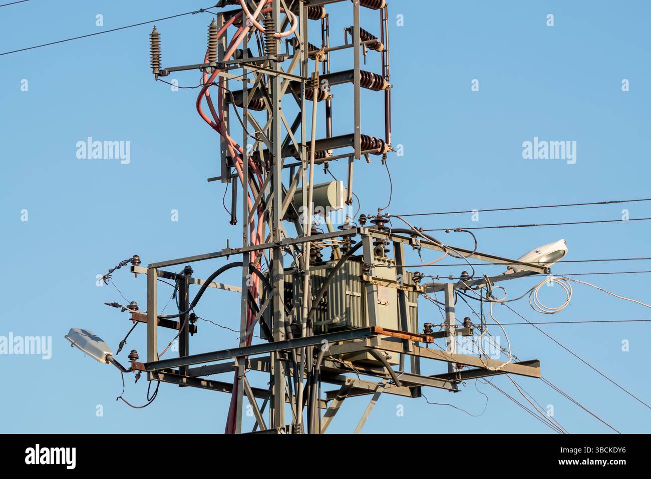 An electric transformer on a electric pole Stock Photo - Alamy