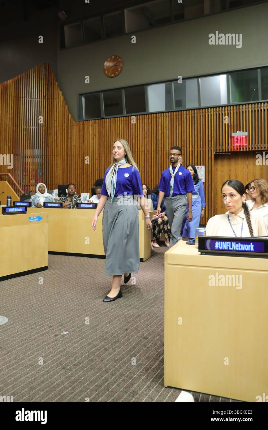 New York, NY - May 19, 2025: UN Tour Guides Uniform models. Global ...