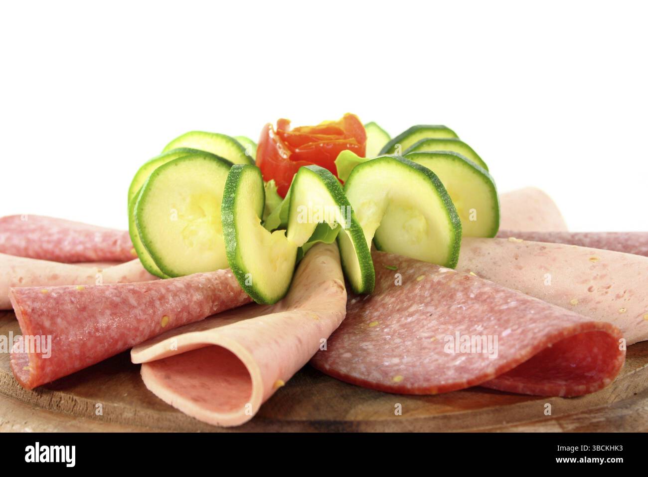 Cold platter with fresh cold cuts and vegetables Stock Photo - Alamy