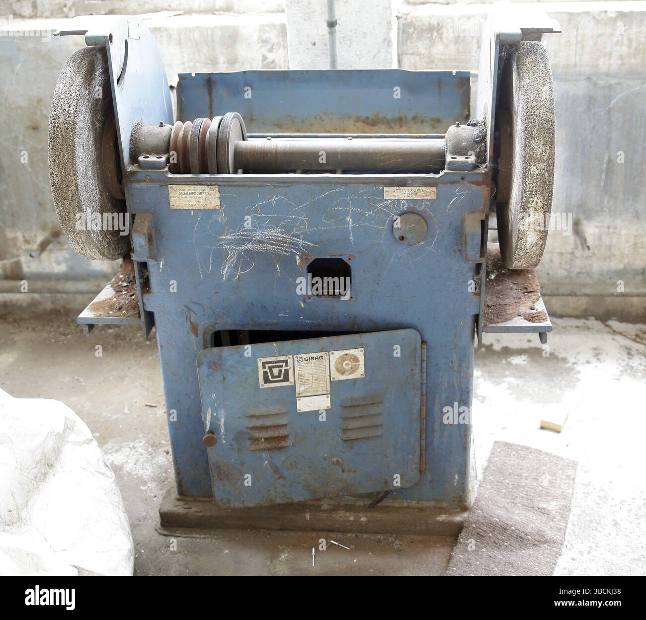 Old grinder with nameplate, old grinder with nameplate Stock Photo - Alamy