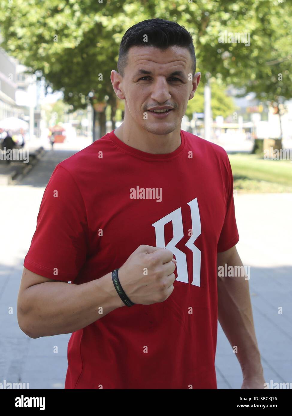 Light-heavyweight boxer Robin Krasniqi from SES Boxing in front of the ...