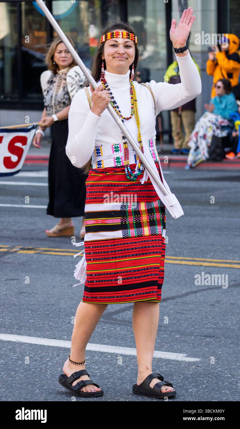 A member of the Philippine community at the Victoria Day Parade on May ...