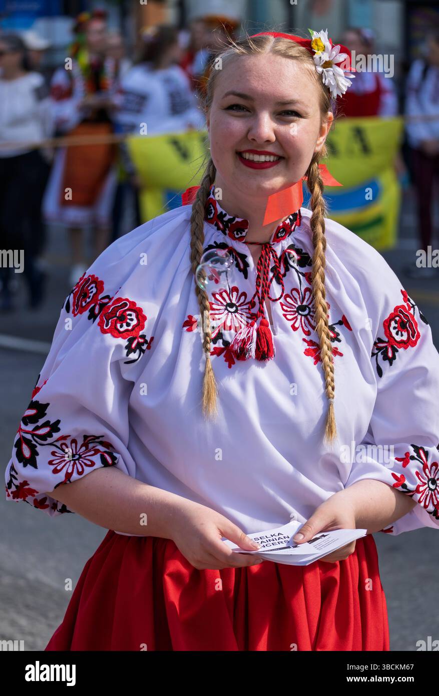 A woman in traditional Ukrainian dress at the Victoria Day Parade on ...