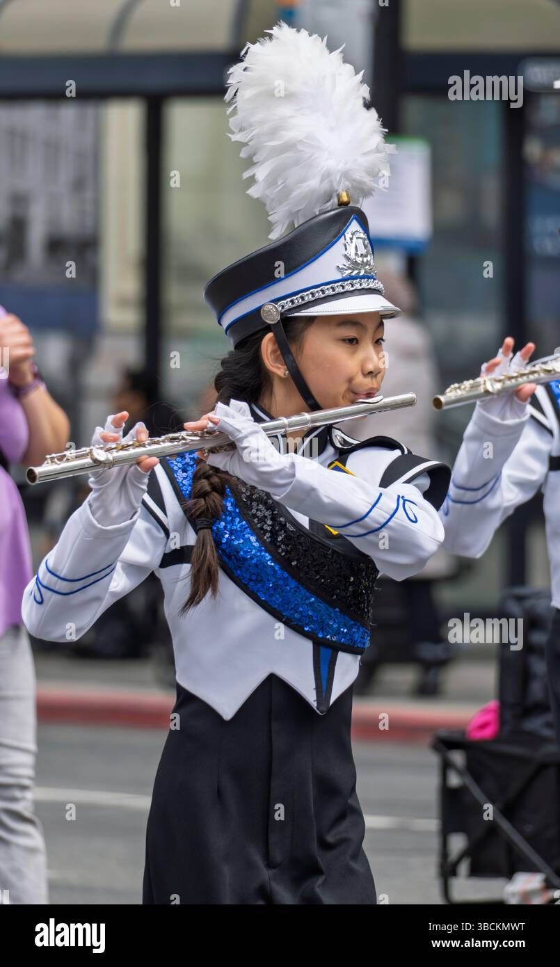A flute player in a marching band at the Victoria Day Parade on May 19 ...