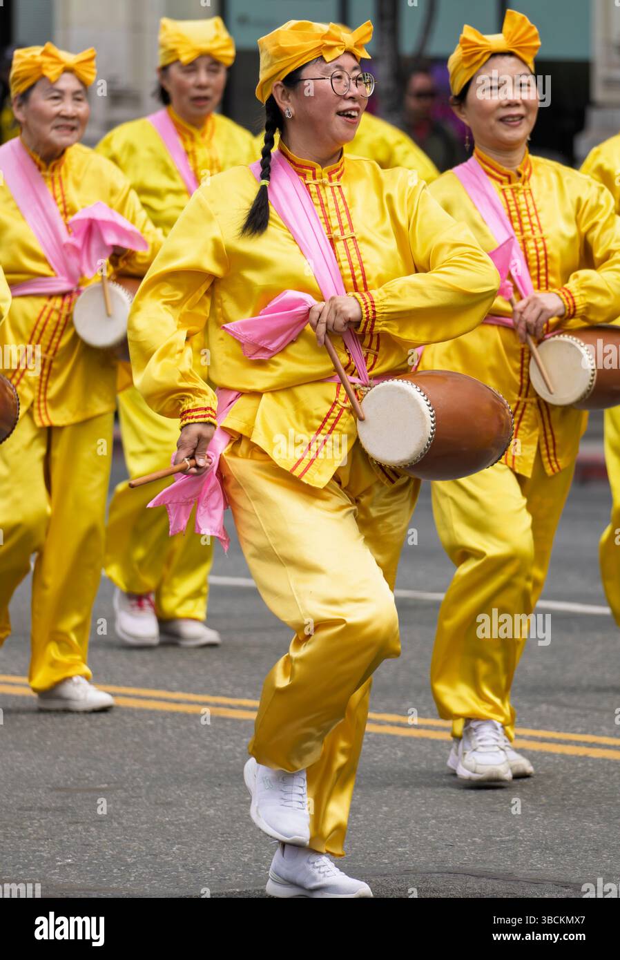 Drummers in yellow costumes at the Victoria Day Parade on May 19, 2025 ...