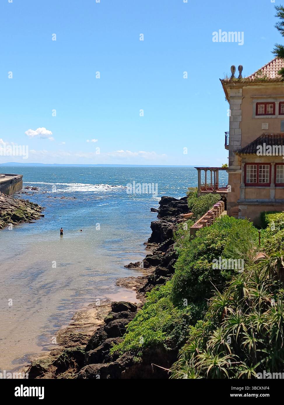 Rocky coastal channel in Cascais Portugal leading to the Atlantic Ocean ...
