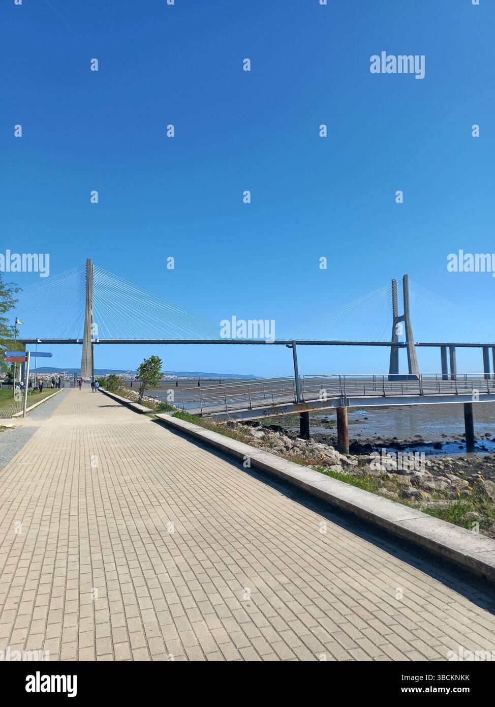 Lisbon Portugal. Vasco da Gama Bridge spans the dry low-tide bed of the ...