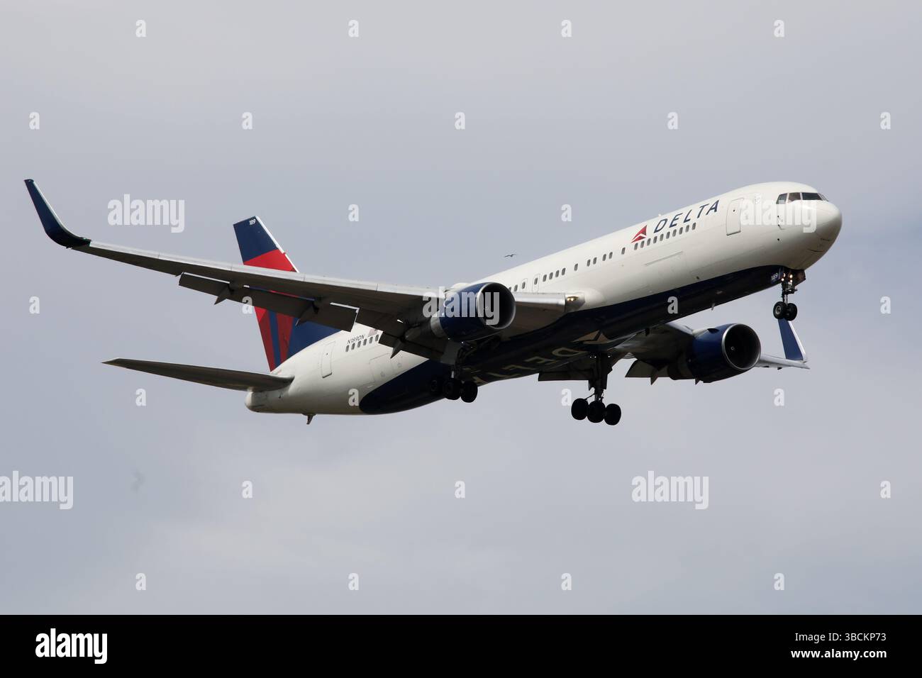 a delta airlines boeing 767-332er plane making its final descent into ...