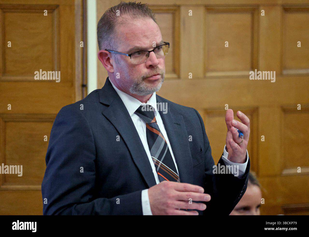 Assistant District Attorney Adam Lally questions a forensic scientist ...