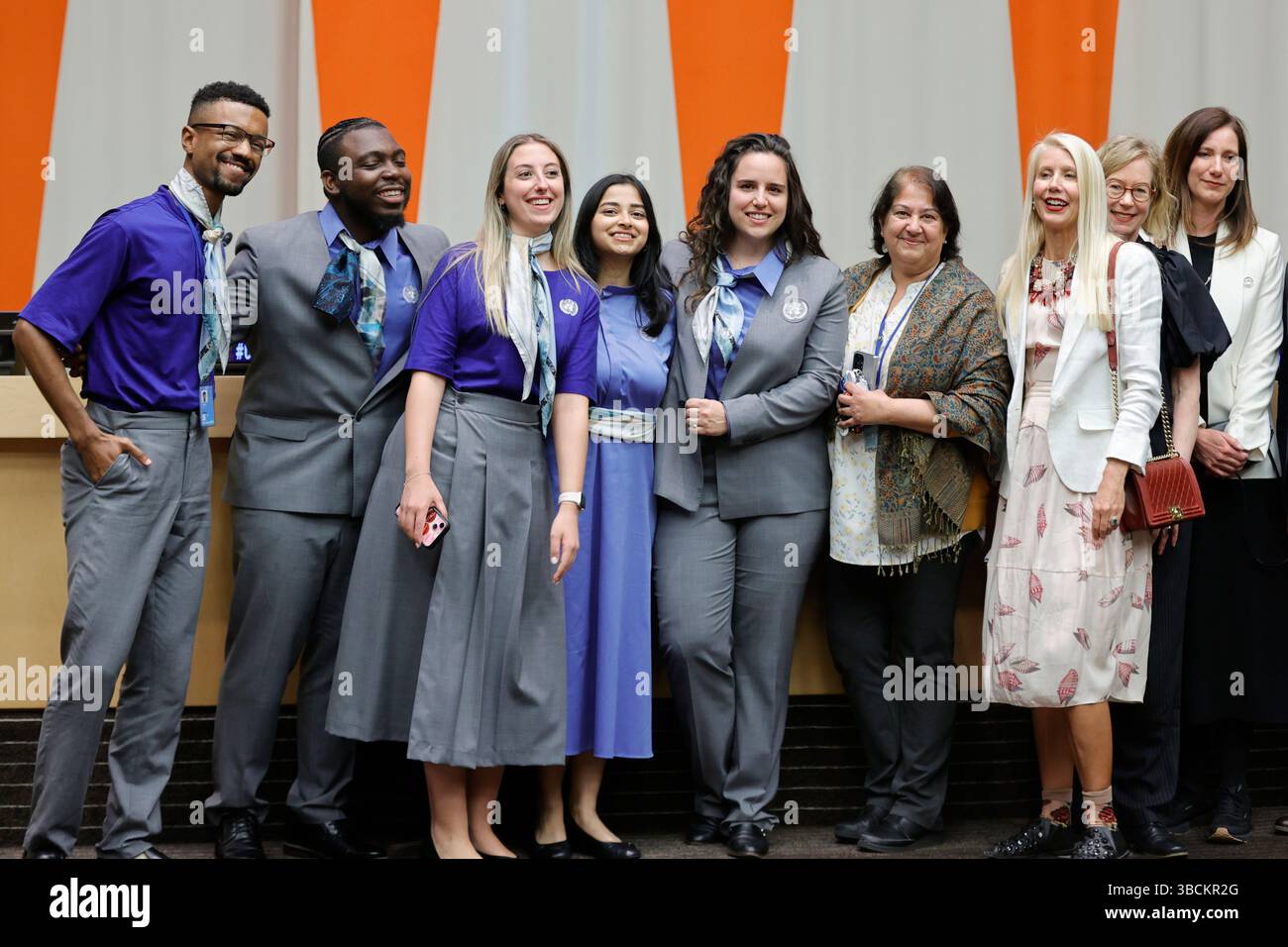 New York, NY - May 19, 2025: Tour Guides Uniform models along with ...