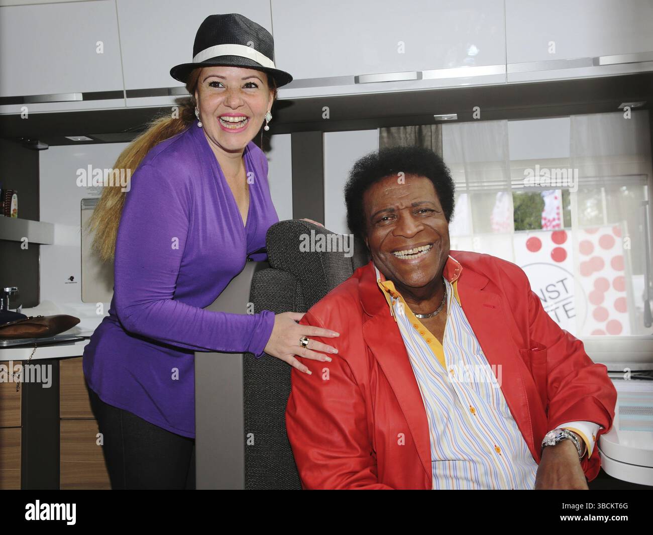 German pop singer Roberto Blanco with his woman Luzandra in his caravan ...
