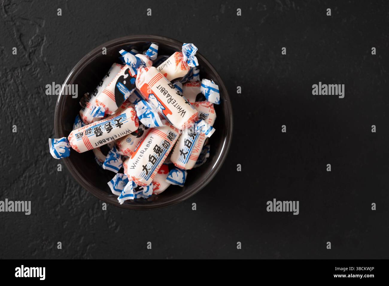 Russia, Moscow 2025 05 20. Heap of famous Chinese White Rabbit Creamy ...