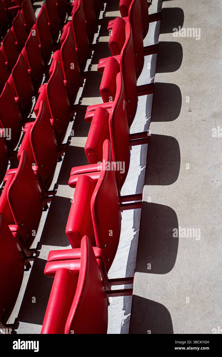 Football vip seats. Red seats in the stadium Stock Photo - Alamy