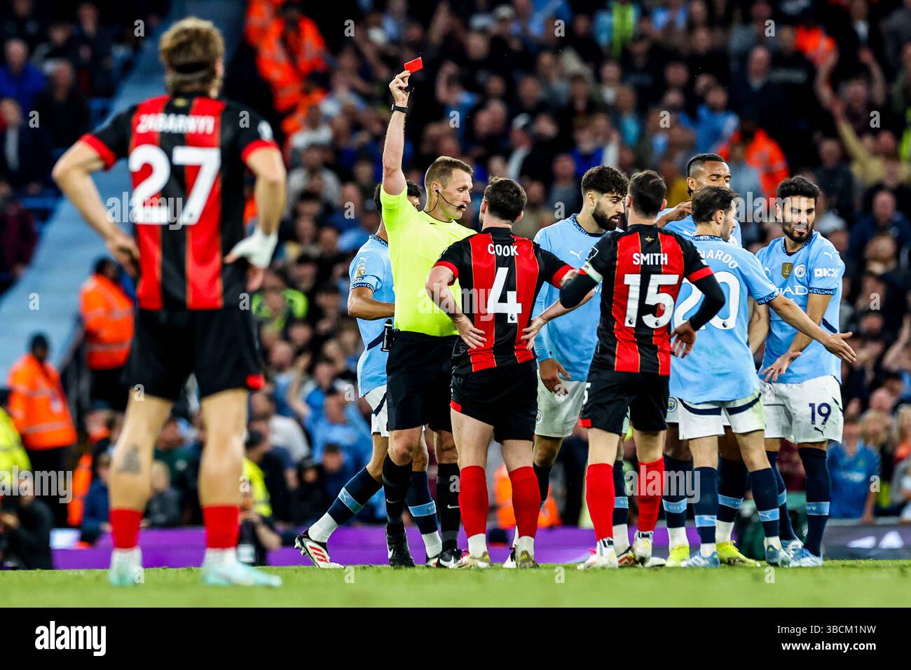 Manchester, UK. 20th May, 2025. Referee Thomas Bramall shows Lewis Cook ...