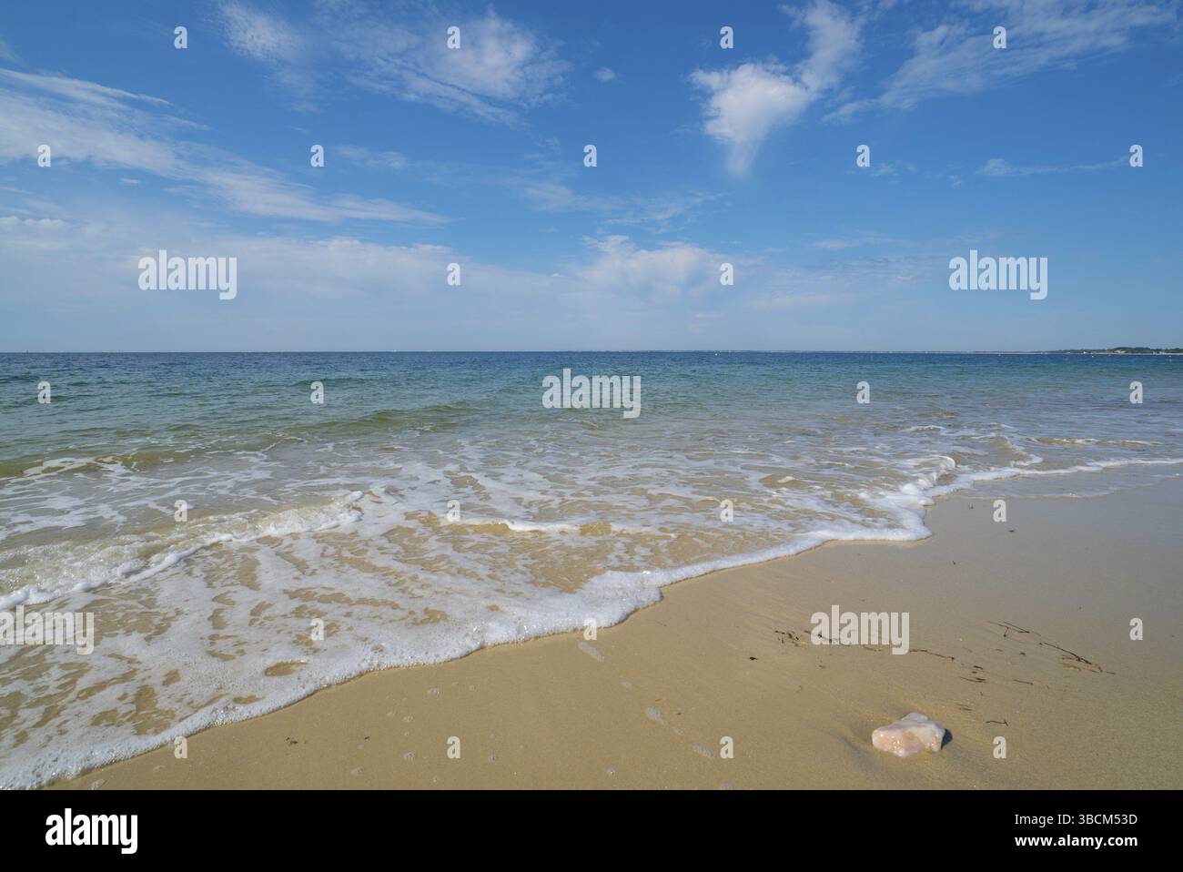 Serene empty beach gentle waves hi-res stock photography and images - Alamy