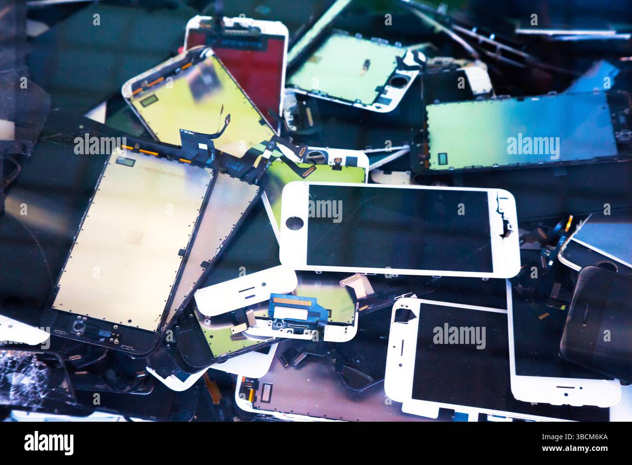 Pile of old broken smartphone phones with broken touch screen Stock ...