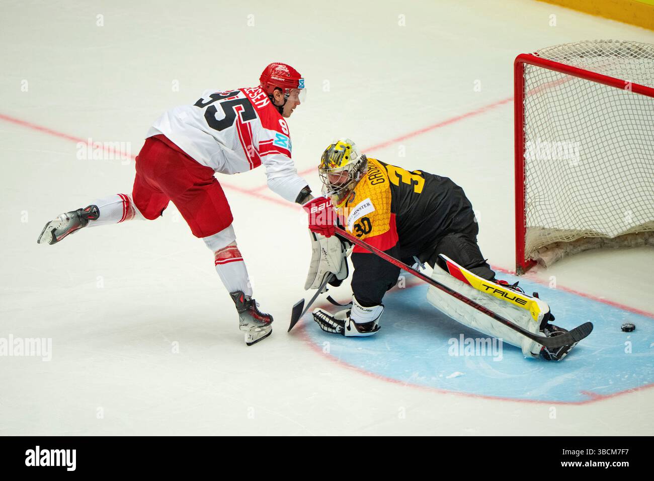 Denmark's Nick Olesen scores on Germany's goalkeeper Philipp Grubauer during a shootout in a ...