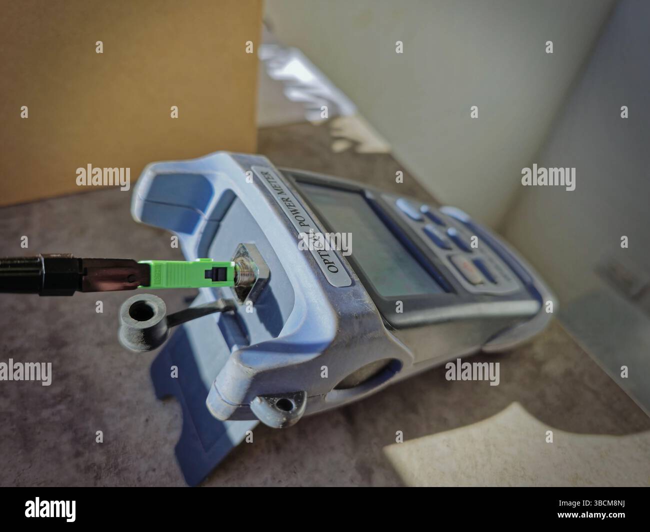 Optical power meter measuring hi-res stock photography and images - Alamy