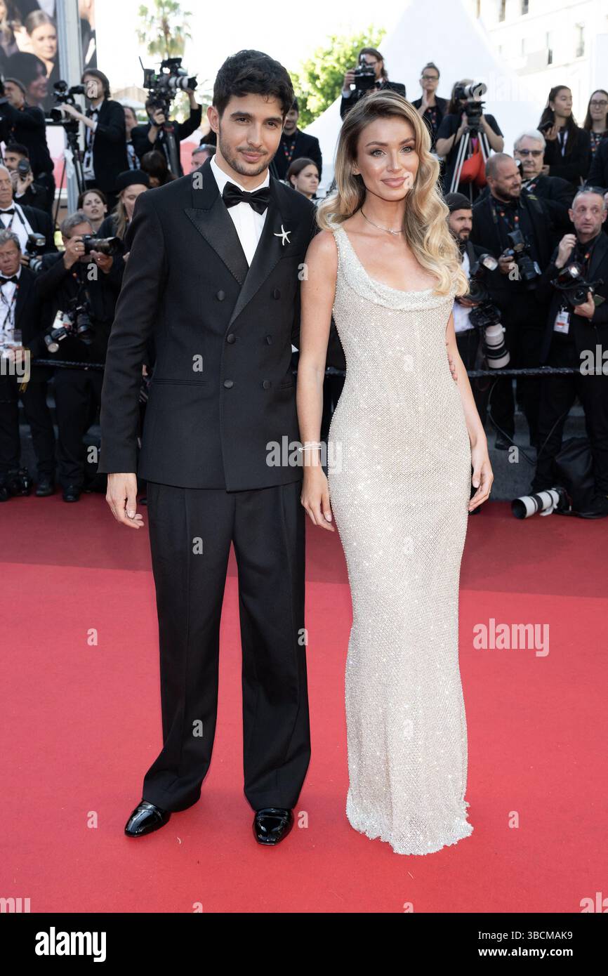 Cannes, France. 20th May, 2025. lavy Barla and Esteban Ocon attend the ...