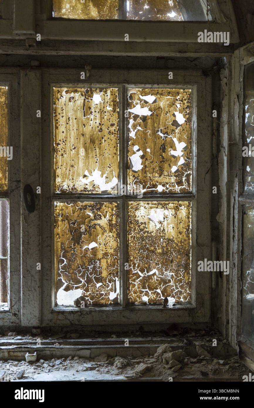Detail of a very old, dirty window with ripped color on it Stock Photo ...