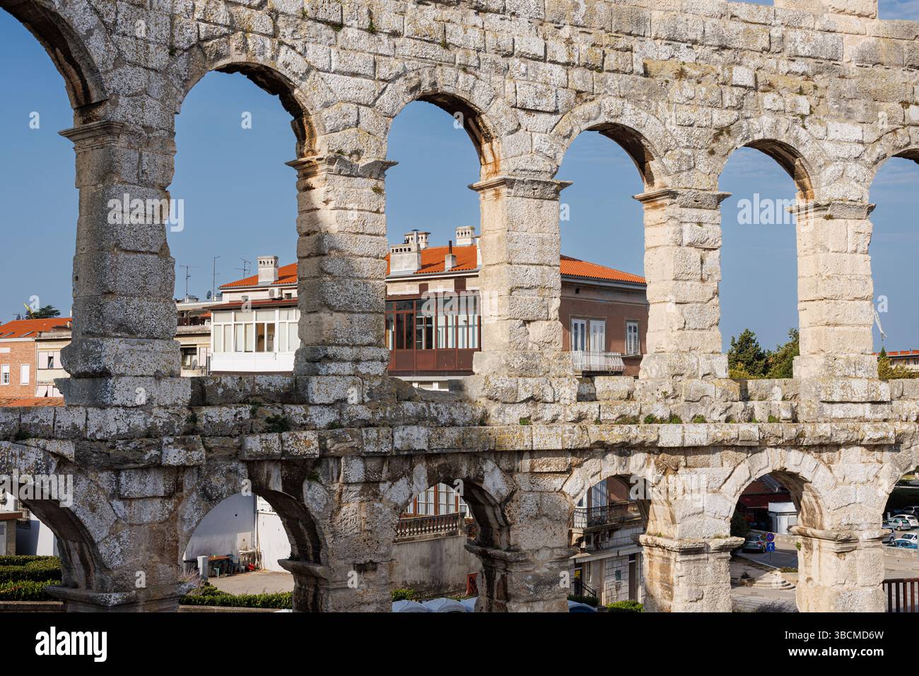 Ancient heritage in Pula, Istria, Croatia. Arches of monumental ancient ...
