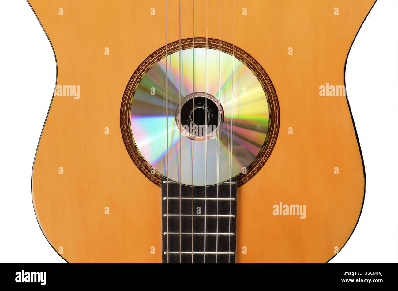 Acoustic guitar with a CD Stock Photo - Alamy