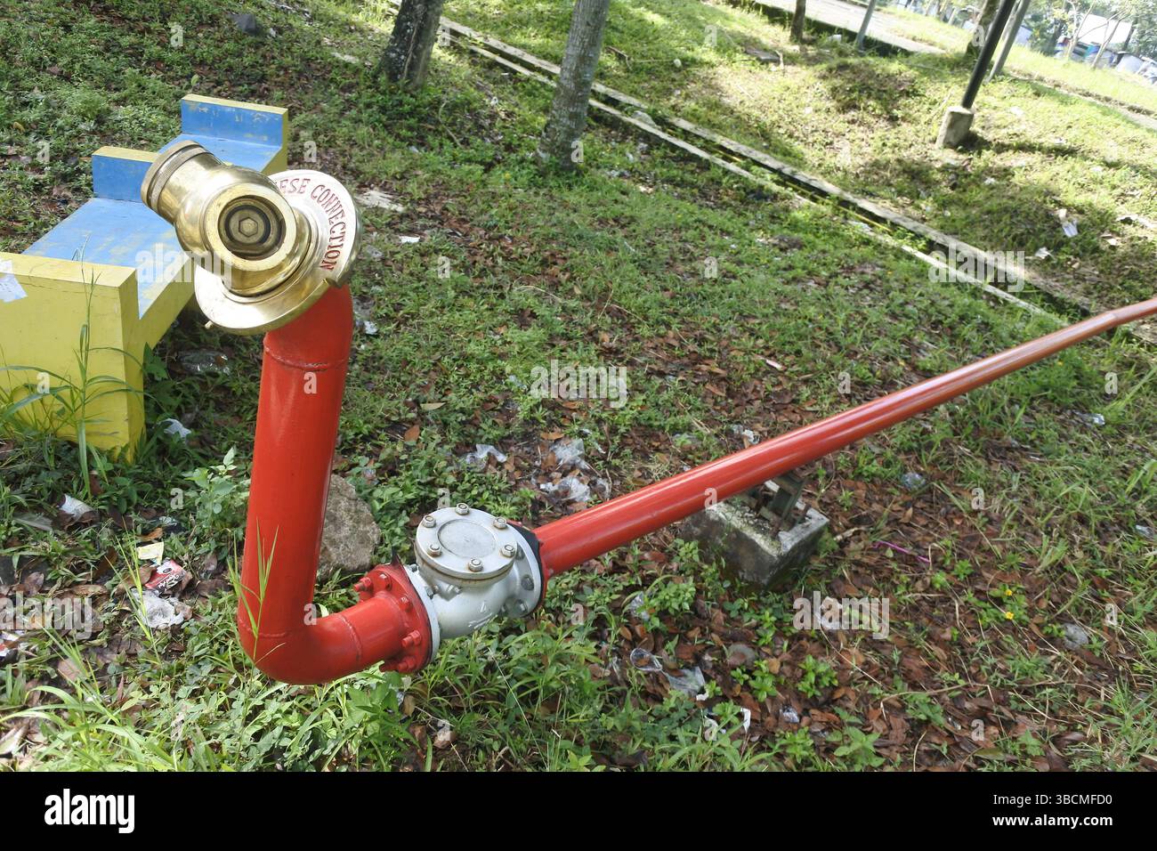 The hydrant iron pipe painted red is a water installation for ...