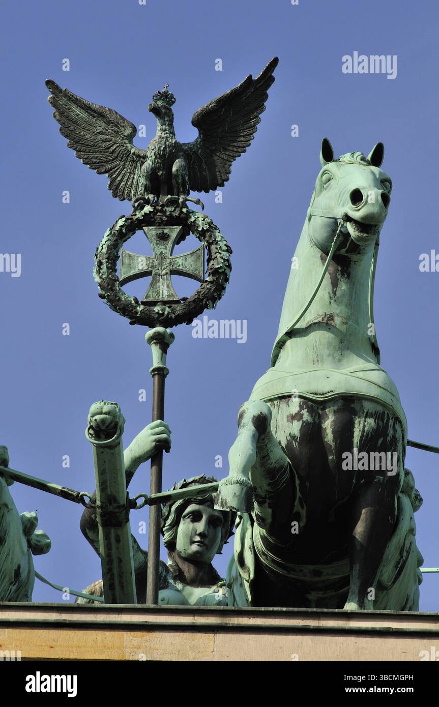 The Brandenburg Gate is crowned by a copper sculpture about five metres ...