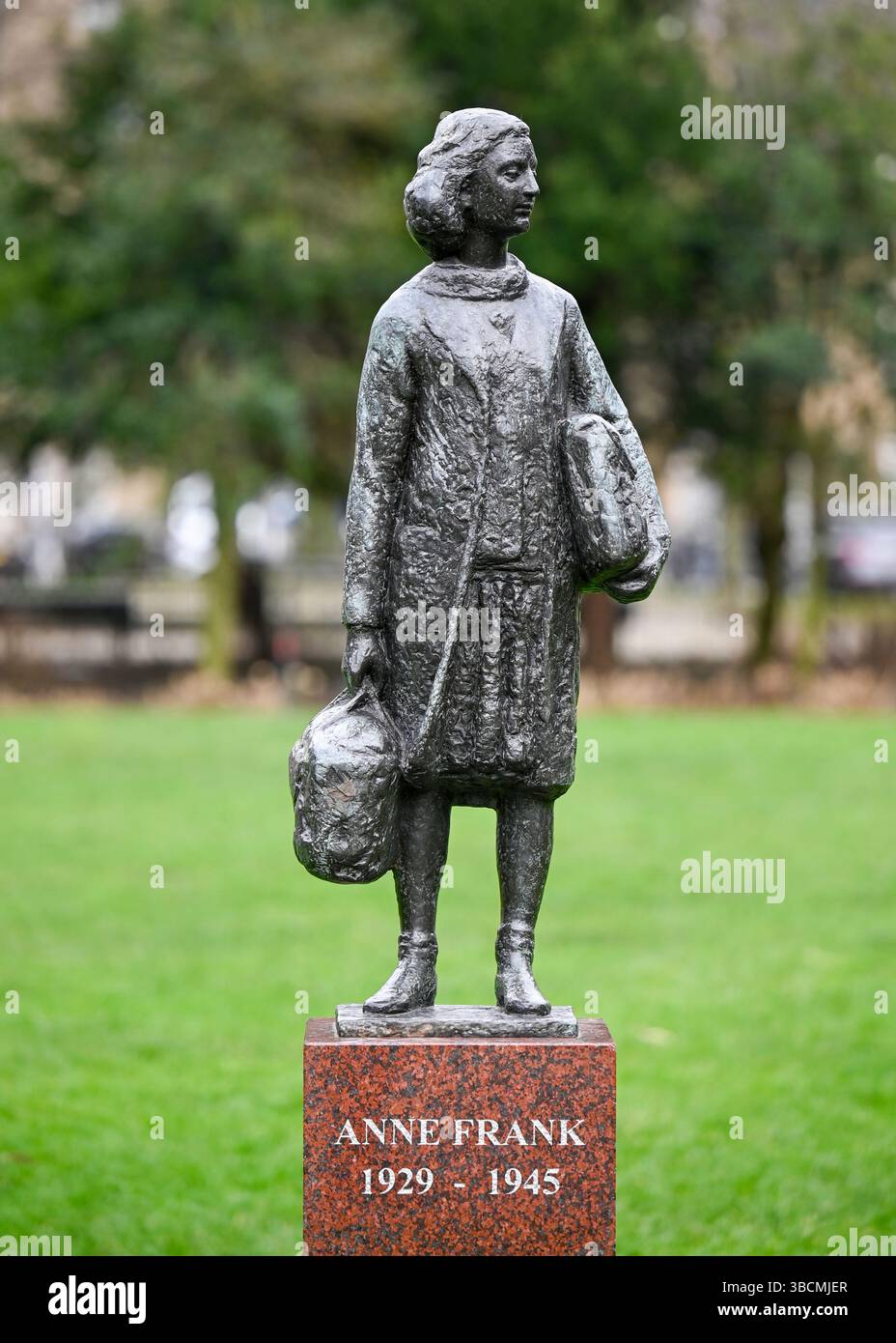 The statue of Anne Frank, situated in the park opposite her family home ...