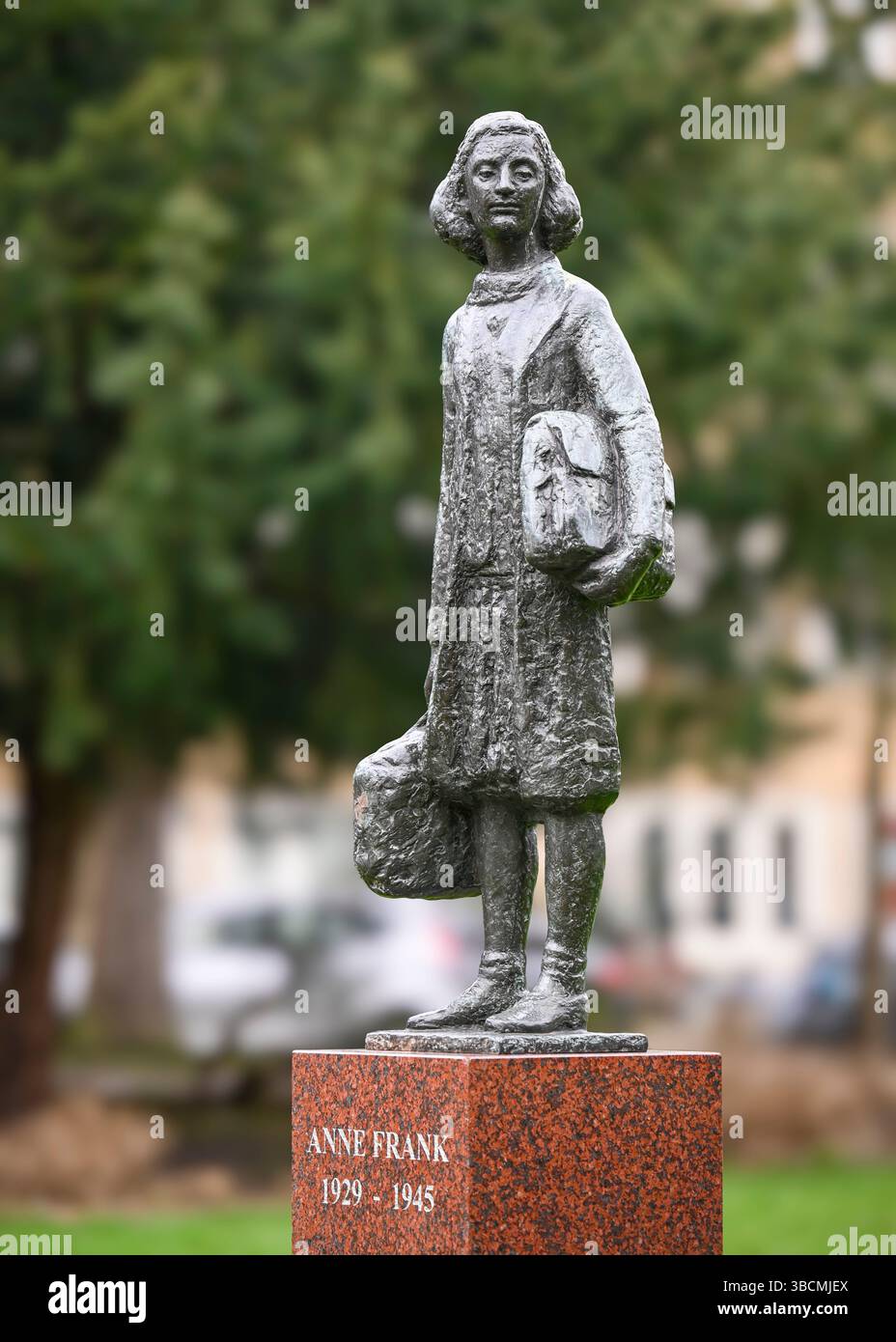 The statue of Anne Frank, situated in the park opposite her family home ...