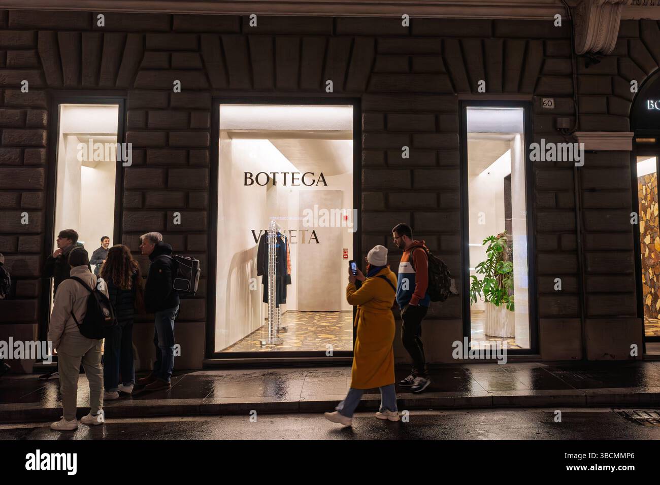 ROME, ITALY - JANUARY 15, 2025: Night view of Bottega Veneta luxury ...