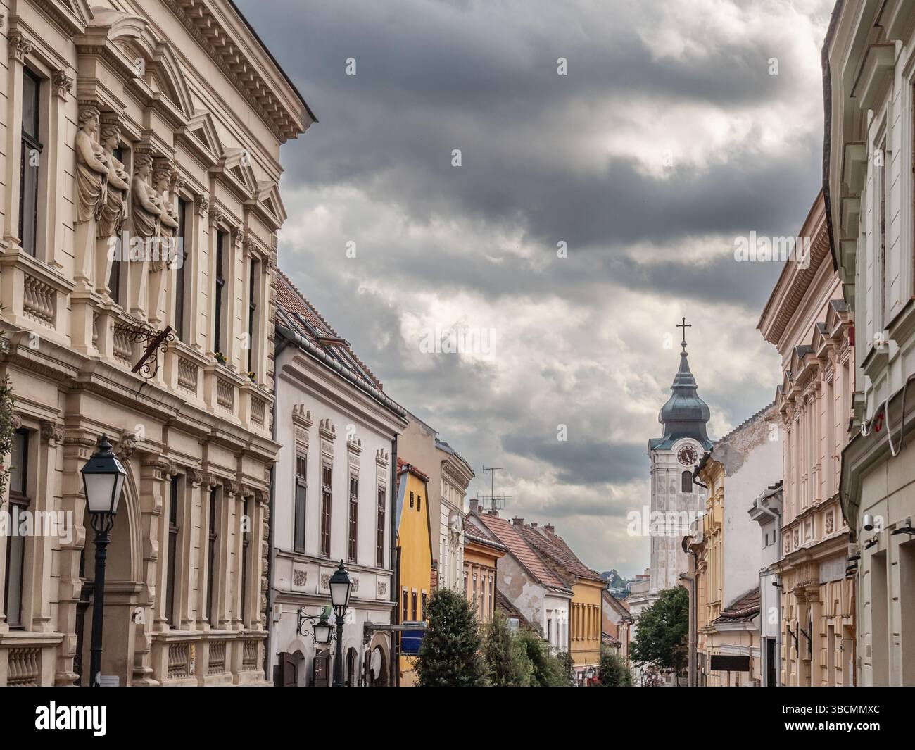 Overcast skies loom above Ferencesek utcaja in Pecs, Hungary where ...