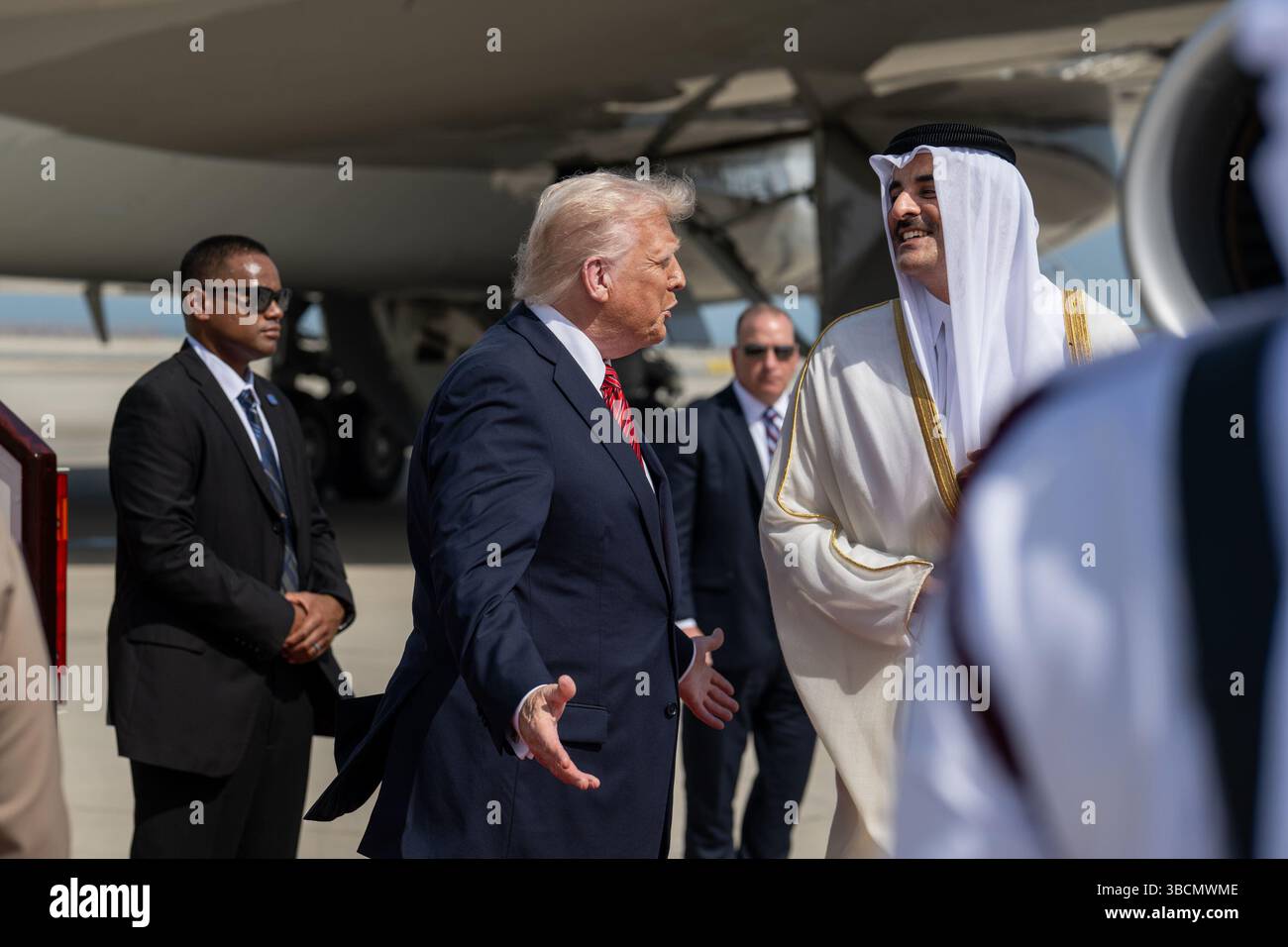 Abu Dhabi, UAE. 14th May, 2025. President Donald Trump greets Amir ...