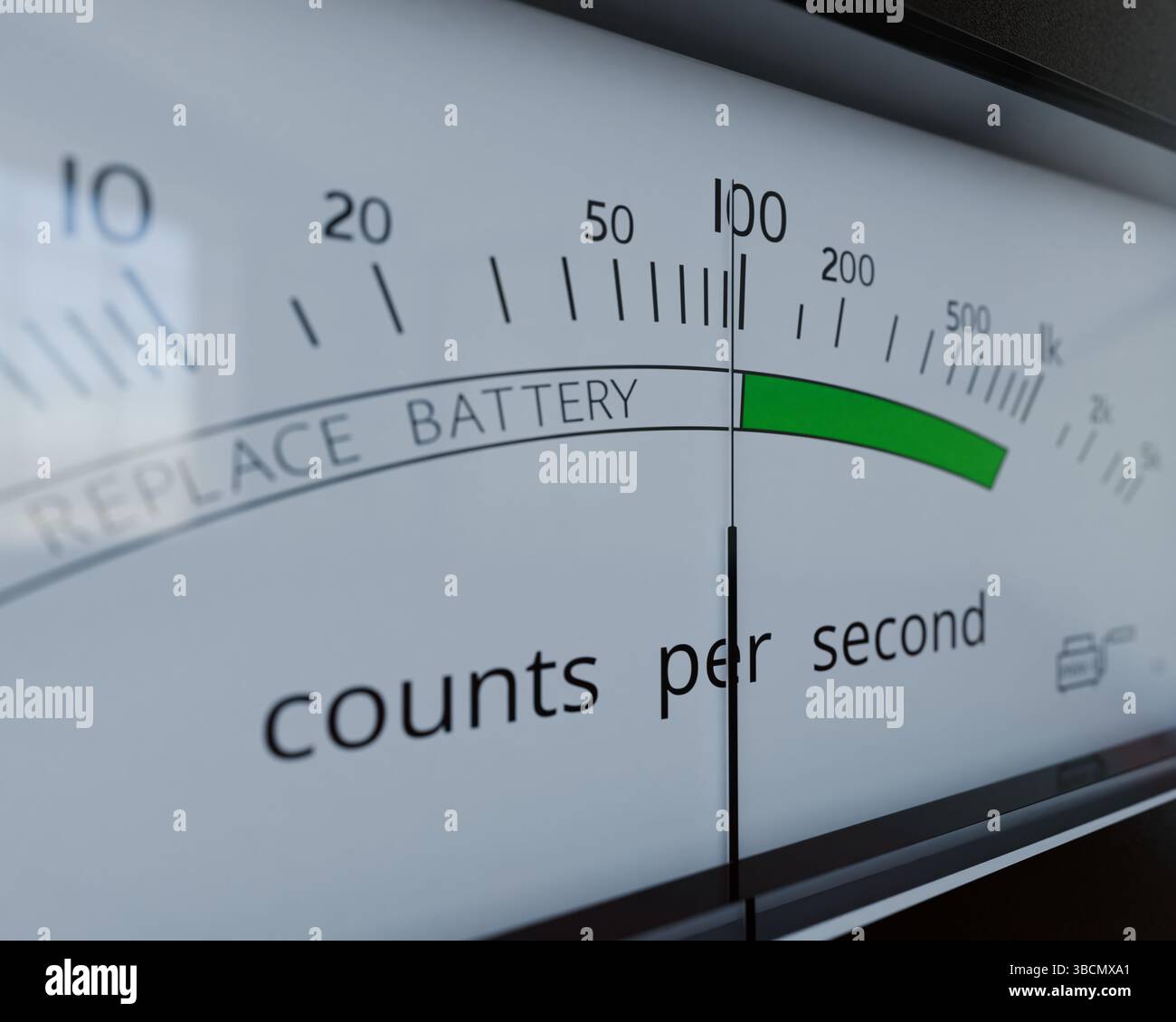 Geiger counter analogue meter closeup. Meter is showing almost 100 cps ...