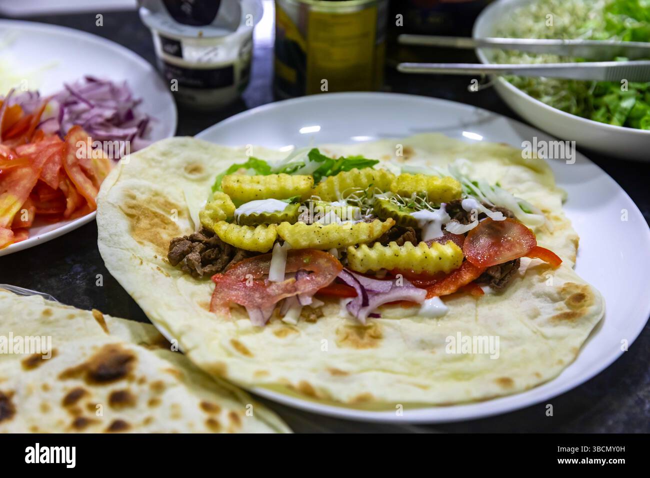 The most traditional and classic shawarma prepared in Syrian bread or ...