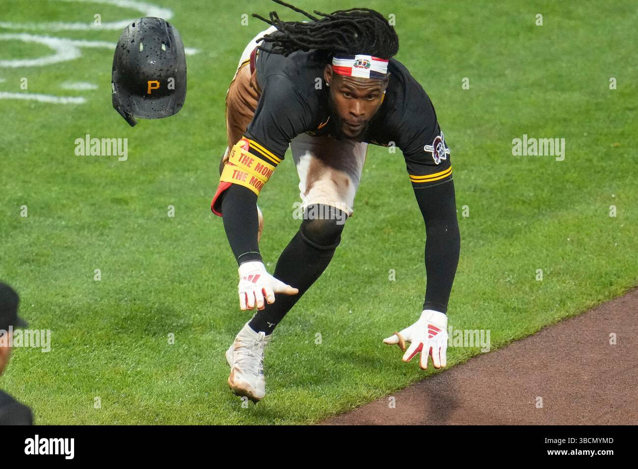 Pittsburgh Pirates' Oneil Cruz begins his slide, scoring from second ...