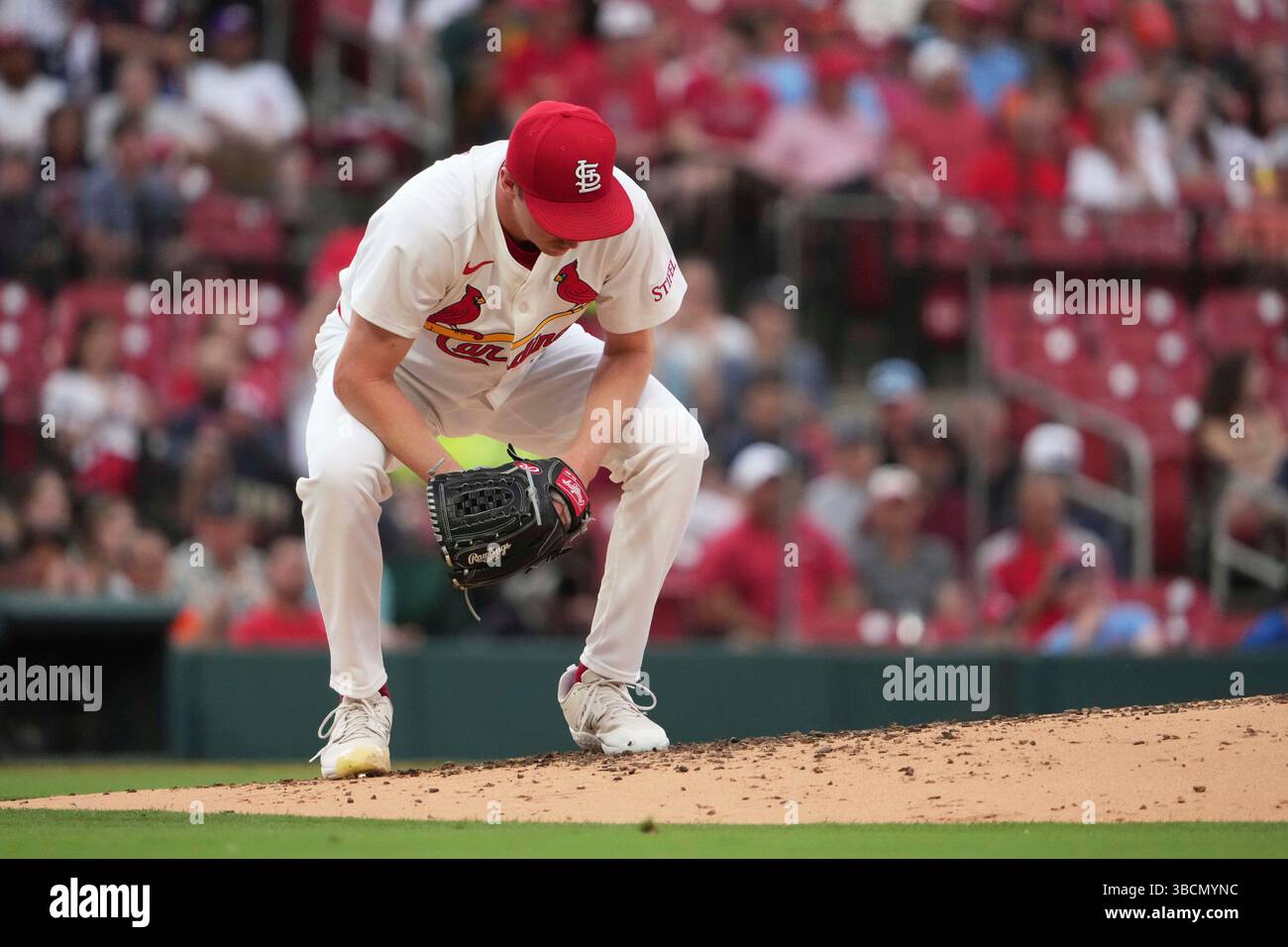 St. Louis Cardinals starting pitcher Erick Fedde reacts after giving up ...