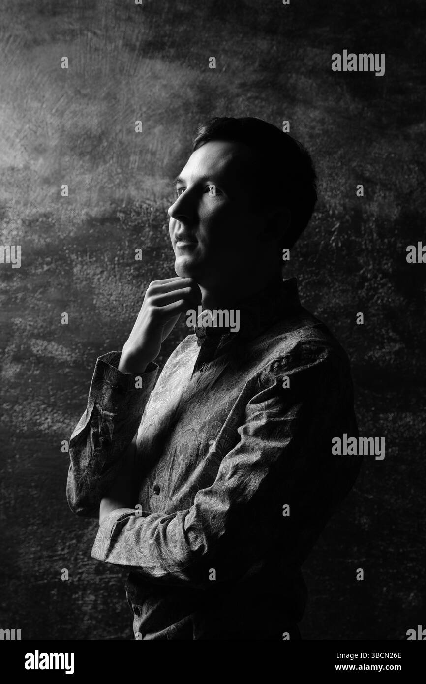 A Contemplative Man in a striking Black and White Portrait that ...
