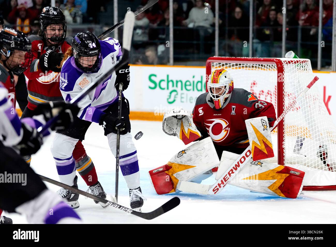 Ottawa Charge goaltender Gwyneth Philips (33) watches the puck as ...