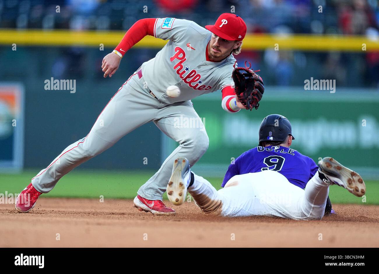 Philadelphia Phillies second baseman Bryson Stott, left, fields the ...