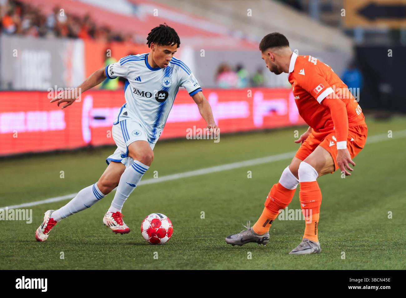 Marko Jevremovic (3) of Hamilton Forge FC defends against Yuri Guboglo ...