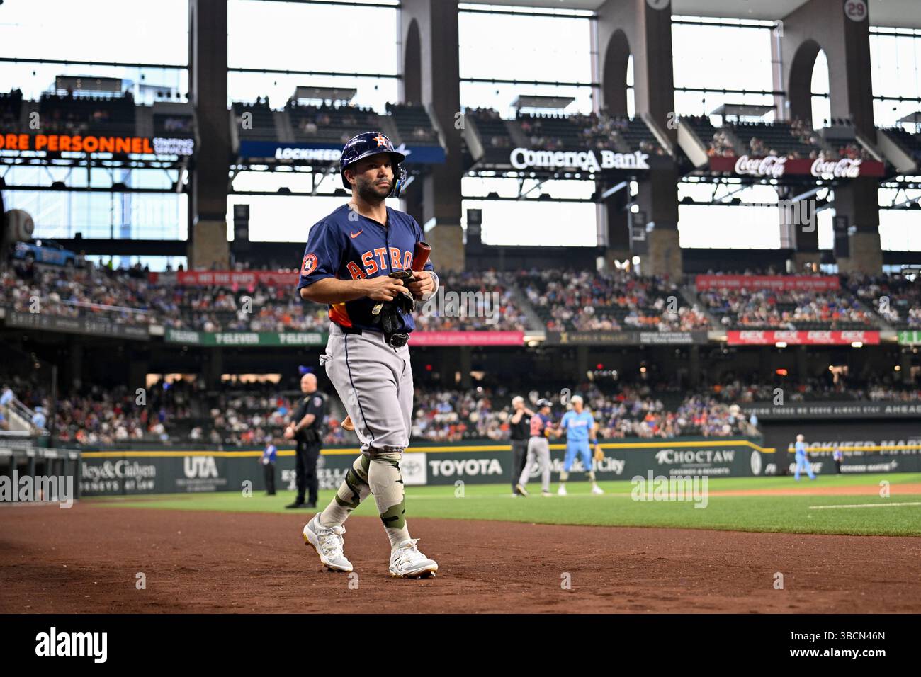 Houston Astros designated hitter Jose Altuve walks on to the field in a ...