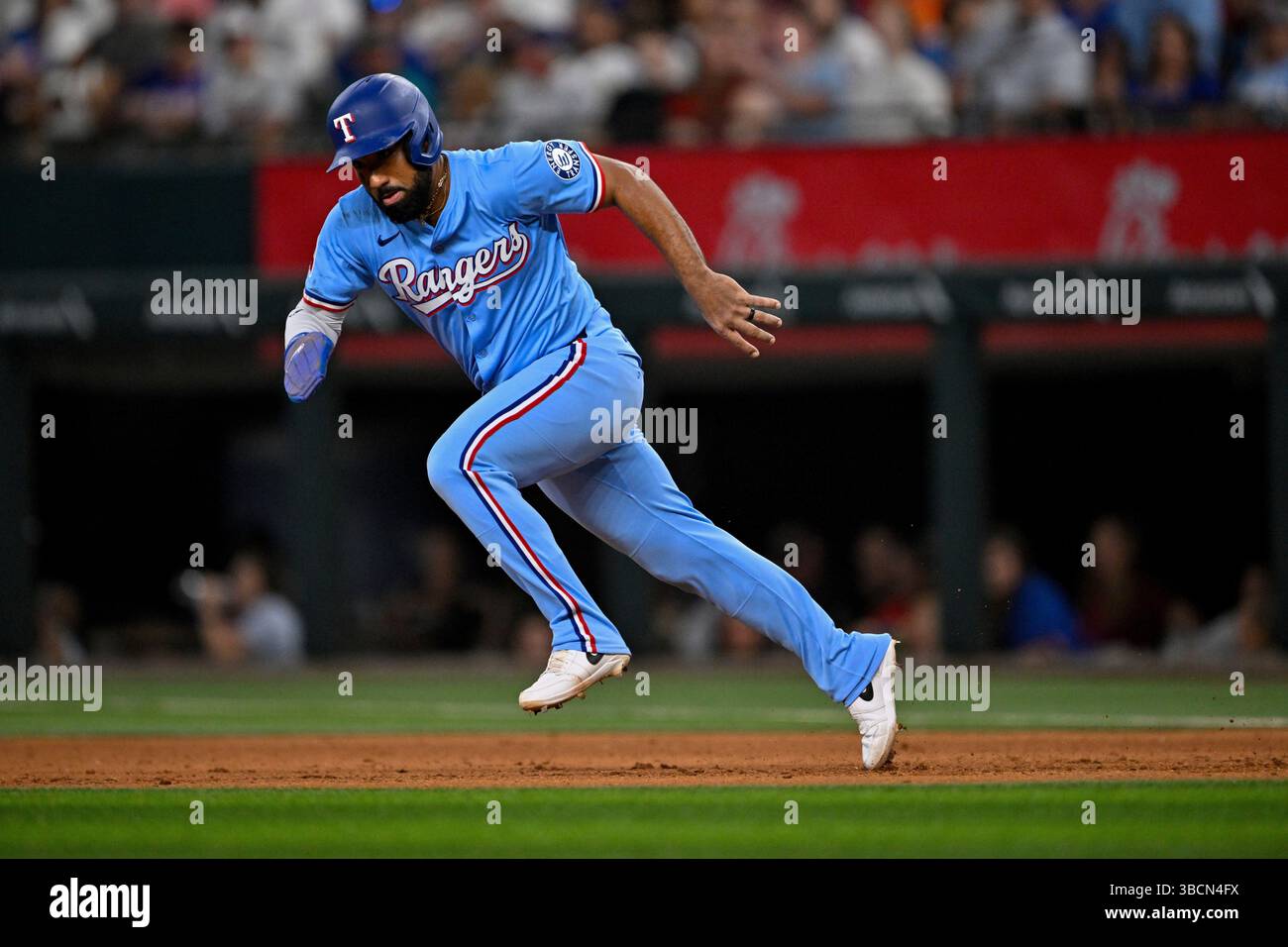 Texas Rangers Ezequiel Duran Runs To Second Base During A Baseball