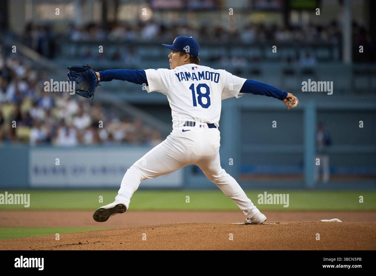 Los Angeles Dodgers starting pitcher Yoshinobu Yamamoto delivers a ...