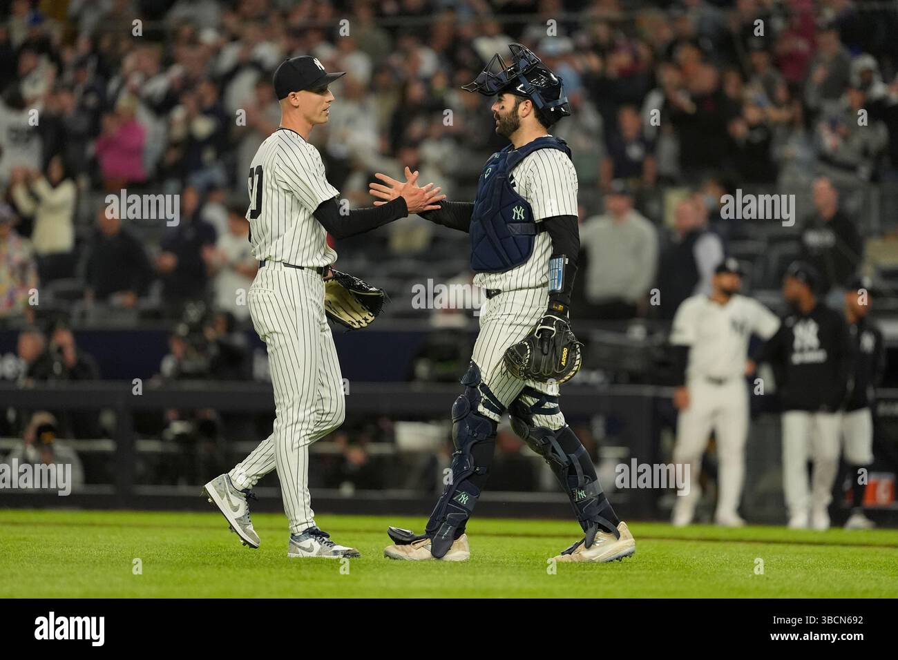 BRONX, NY - MAY 20: New York Yankees Pitcher Luke Weaver (30) and ...