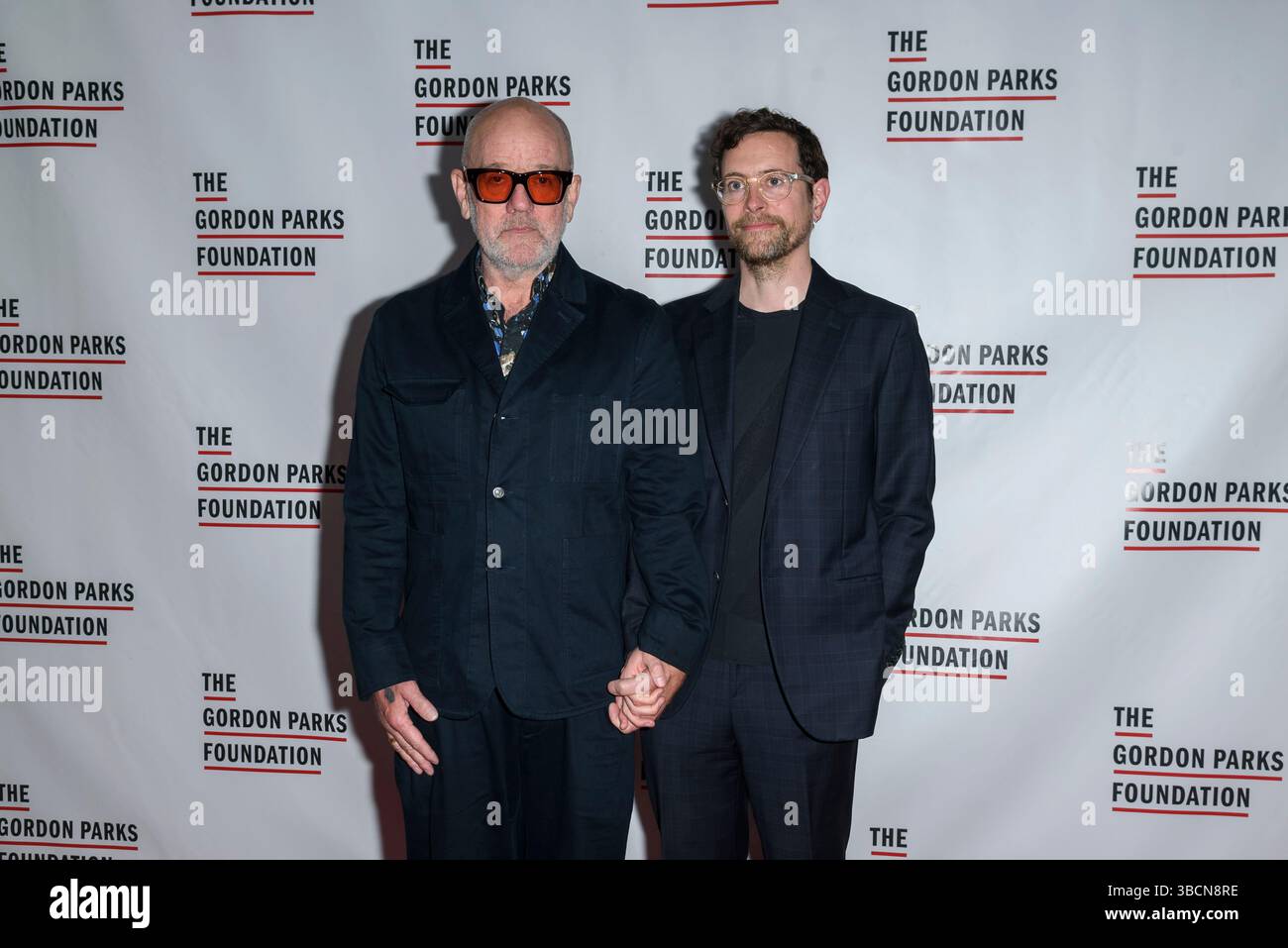 Michael Stipe, left, and Thomas Dozol attend the Gordon Parks ...