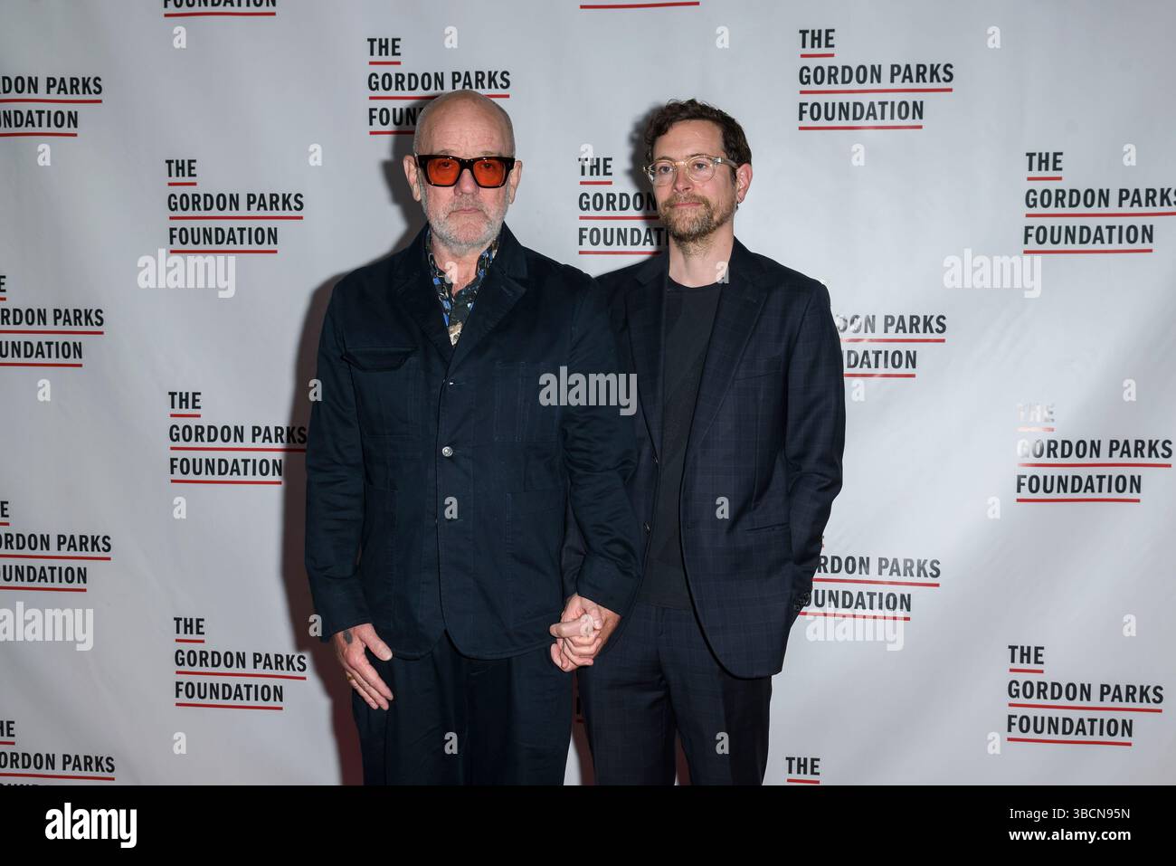 Michael Stipe, left, and Thomas Dozol attend the Gordon Parks ...