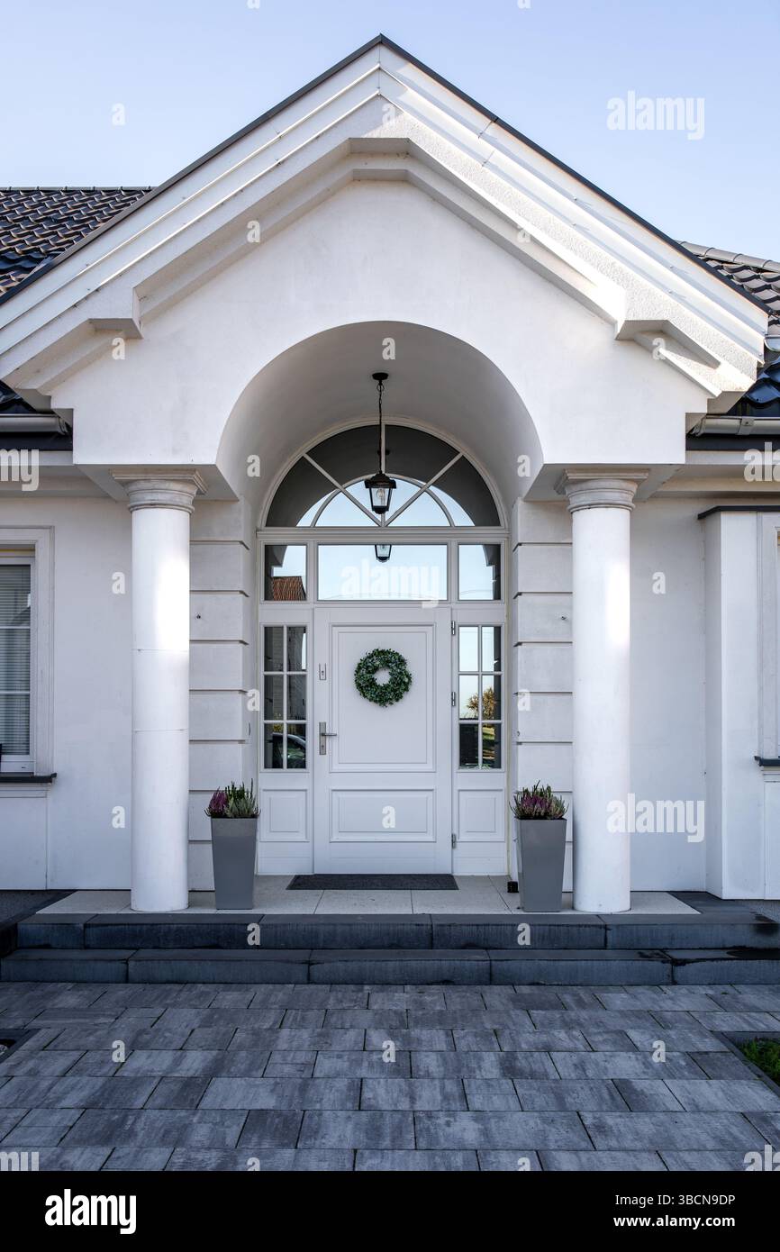 A front door detail with a stone accent wall, modern and luxury door ...