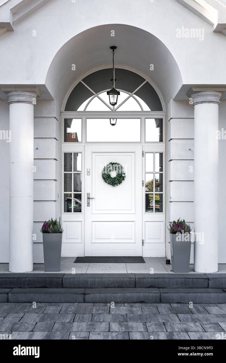A front door detail with a stone accent wall, modern and luxury door ...