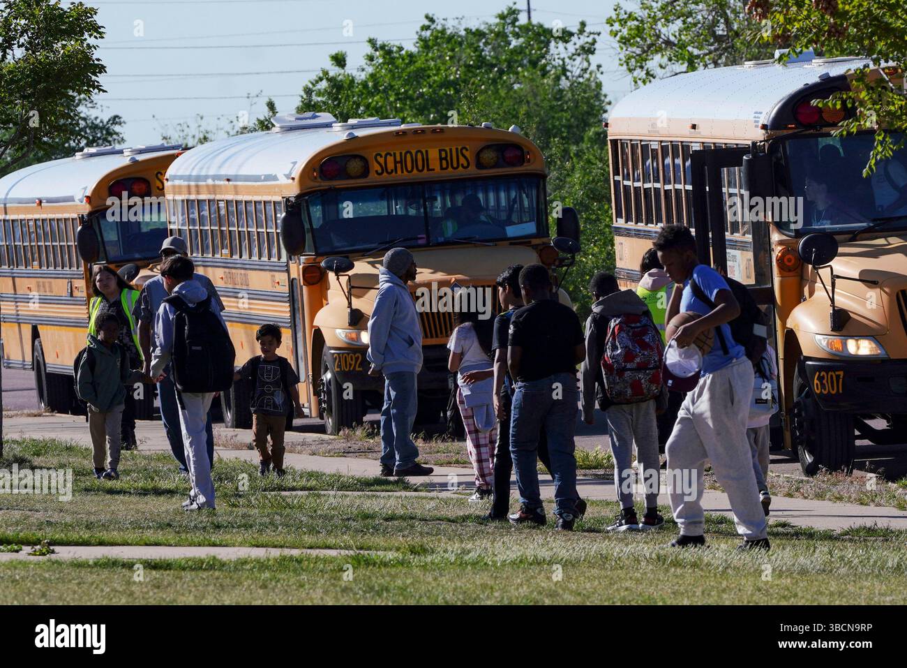 Students walk into Place Bridge Academy, May 20, 2025, in Denver. (AP ...